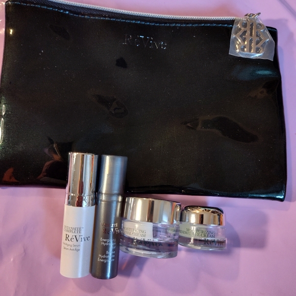 revive | Skincare | Revive Makeup Bag With Four Beauty Products | Poshmark